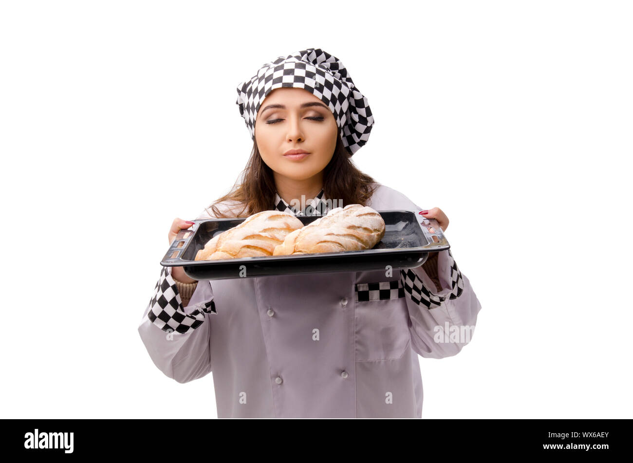 Young female baker isolated on white Stock Photo - Alamy
