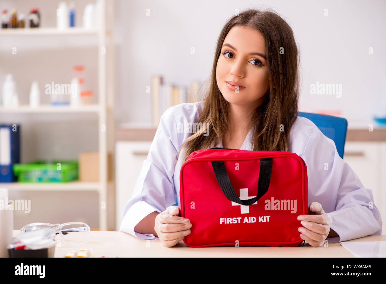 Female beautiful doctor with first aid bag Stock Photo - Alamy