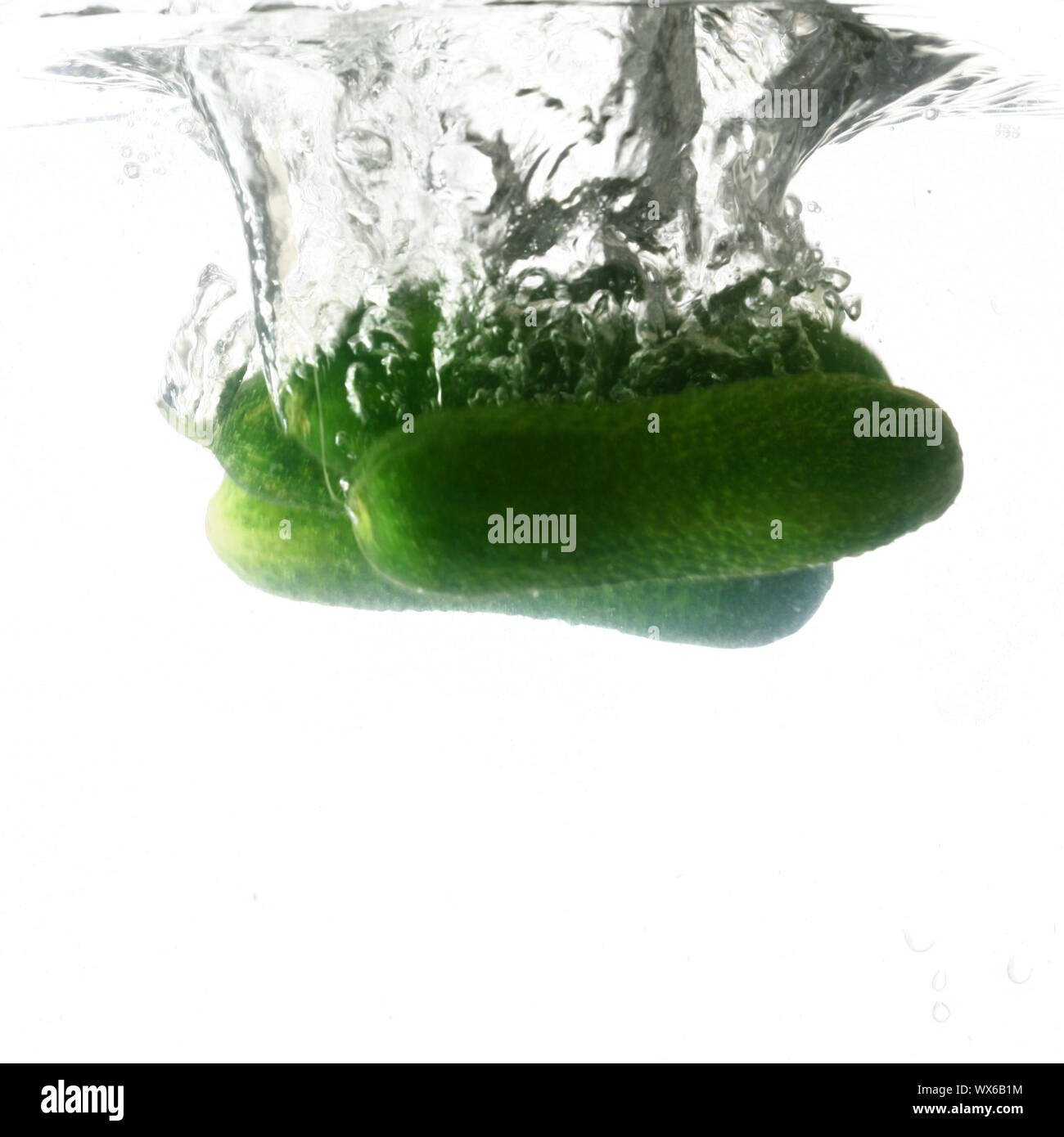 cucumber splash isolated on white background Stock Photo - Alamy