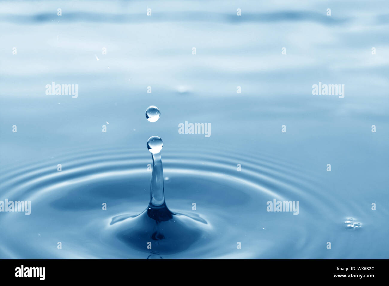 water drop super splash macro close up Stock Photo - Alamy
