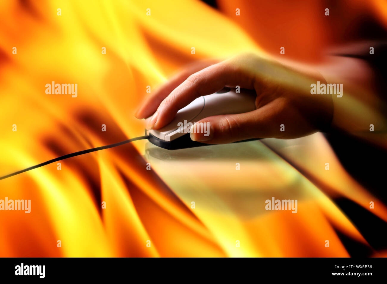 mouse in hand hard work concept Stock Photo - Alamy