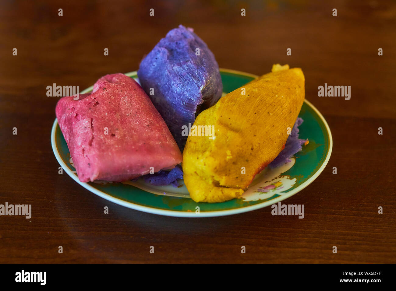 Corn tamales in colors, traditional Mexican food, sweet and chili ...