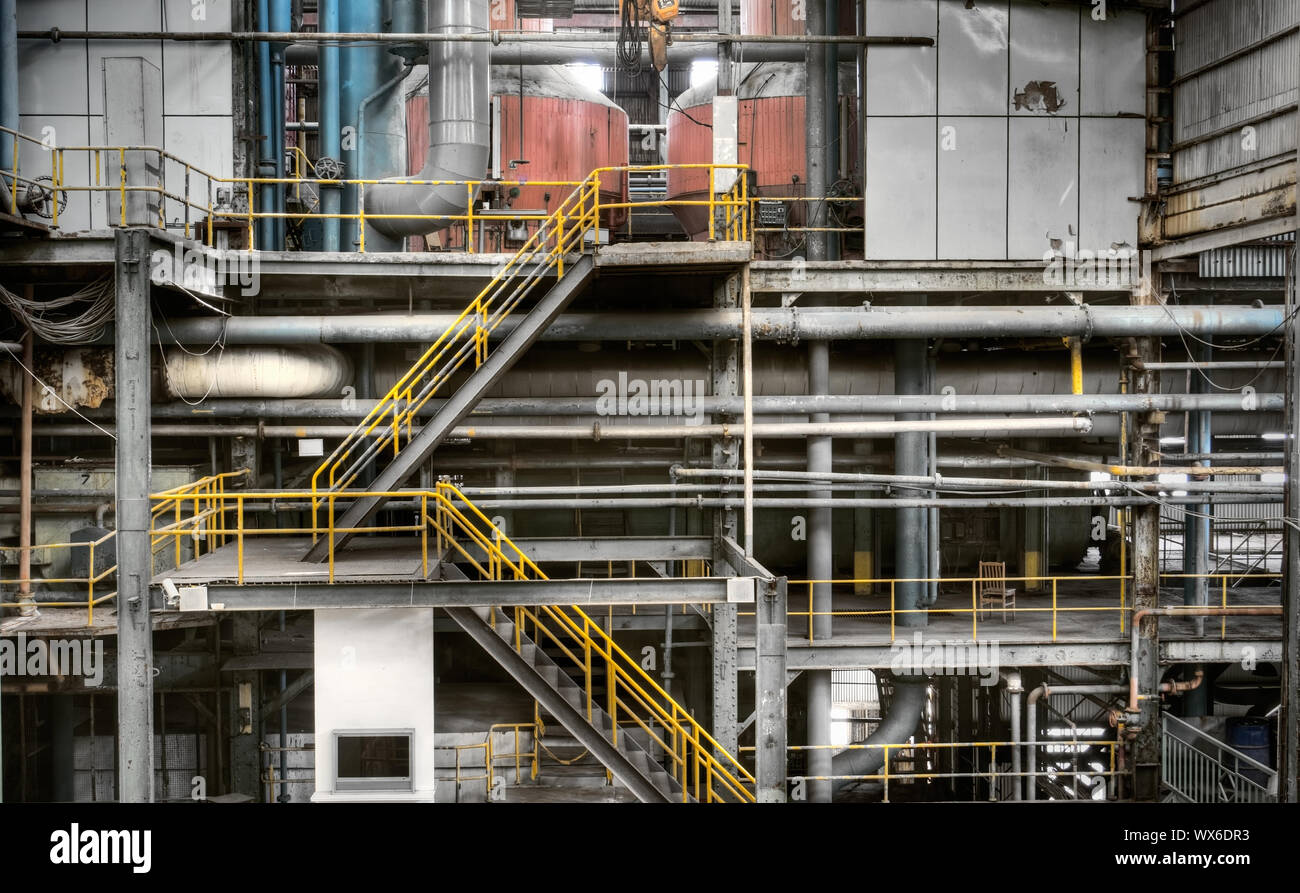 View of industrial factory interior with stairs Stock Photo - Alamy