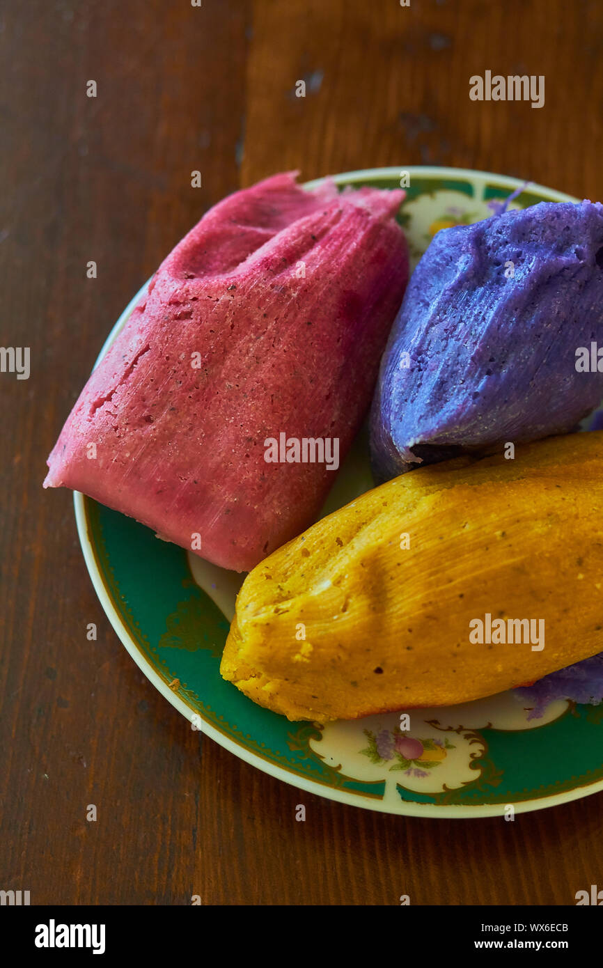 Corn tamales in colors, traditional Mexican food, sweet and chili ...