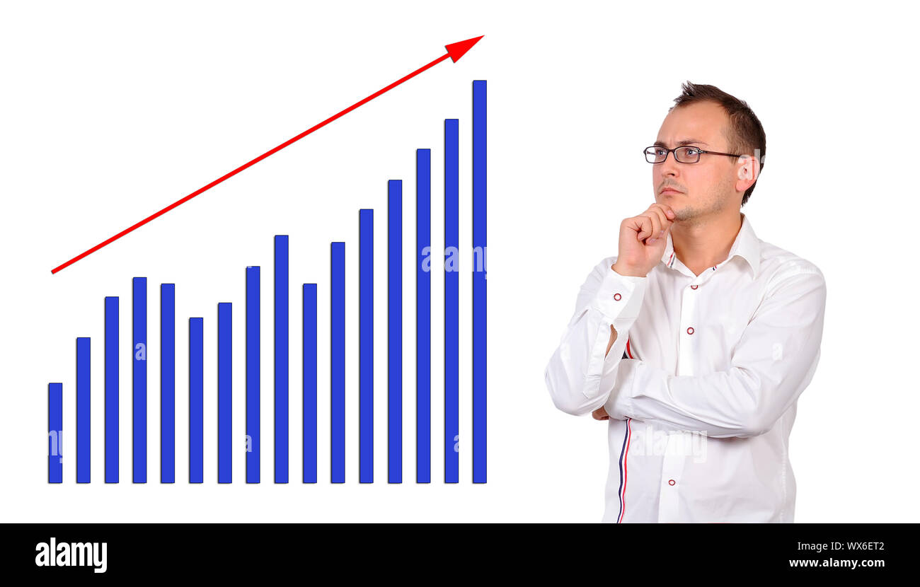 pensive businessman looking at growth chart profit Stock Photo - Alamy