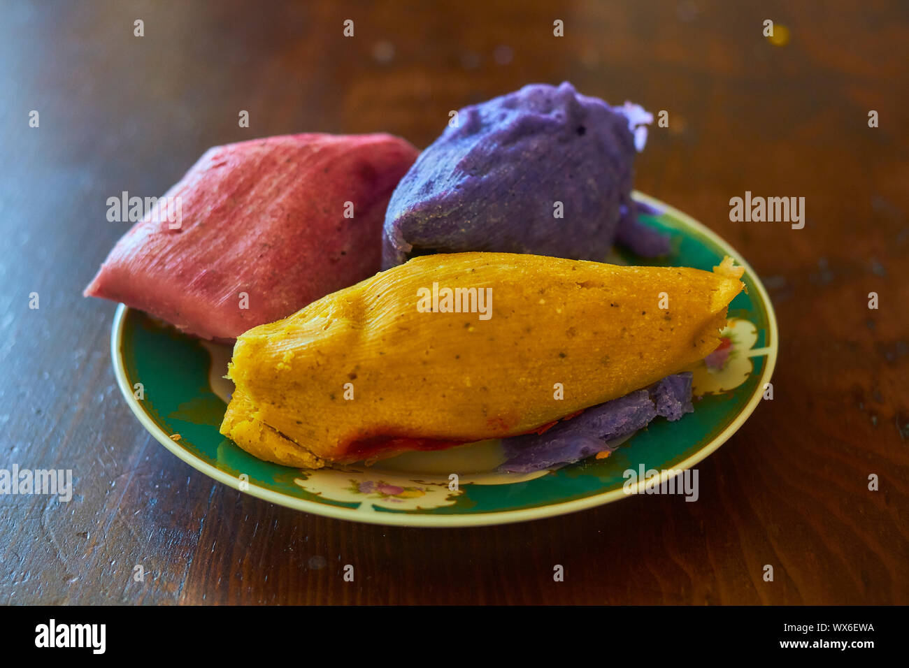 Corn tamales in colors, traditional Mexican food, sweet and chili ...