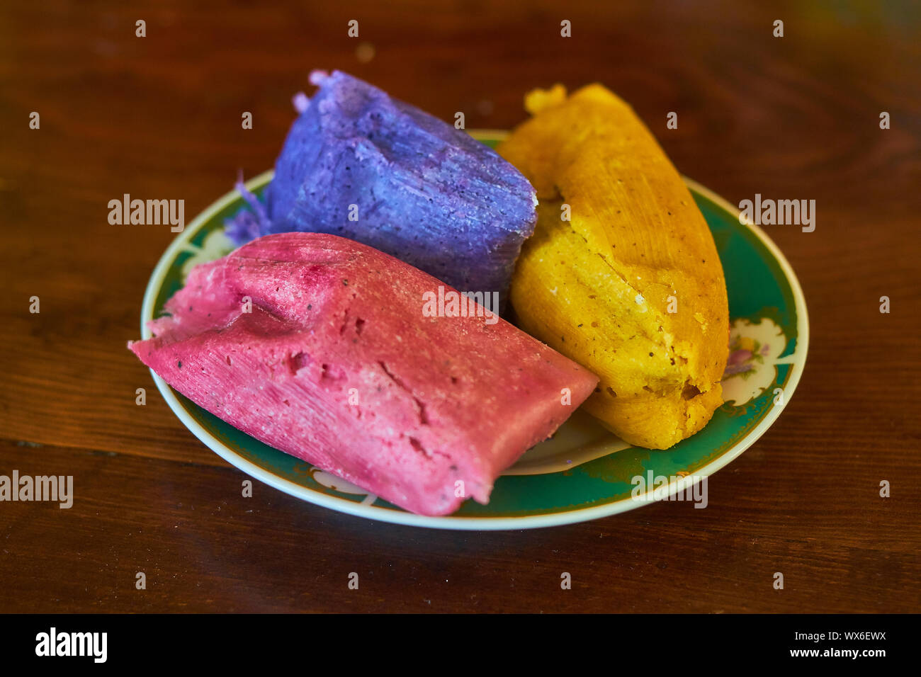 Corn tamales in colors, traditional Mexican food, sweet and chili ...
