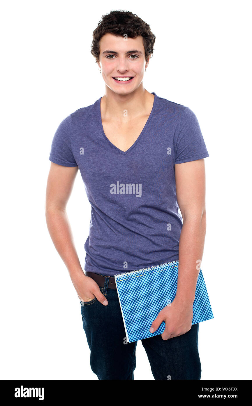 Stylish teenager posing casually in denims isolated against white ...