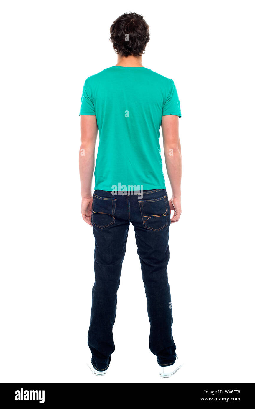 Rear view of teen guy in casuals. Full length portrait Stock Photo - Alamy