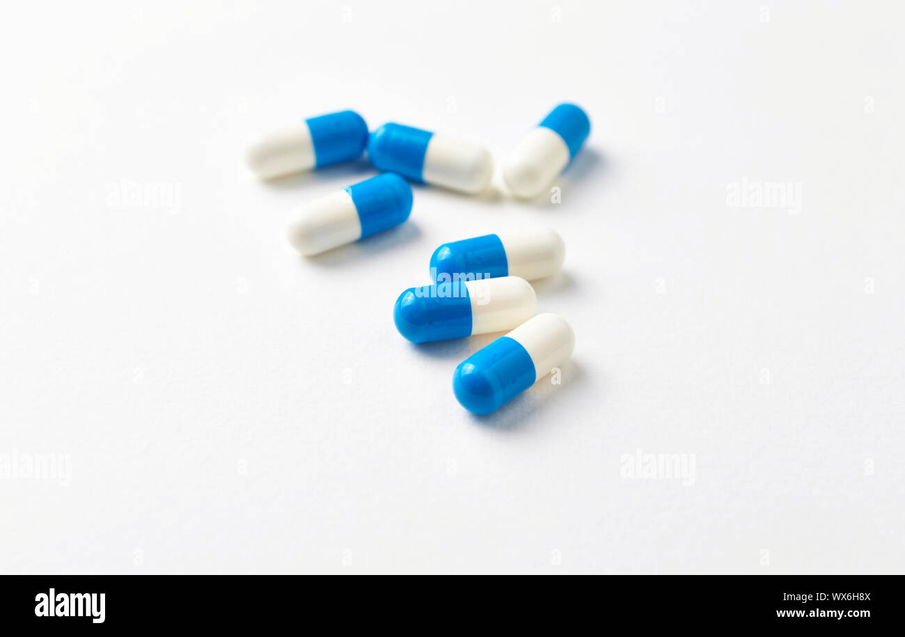 Tri-Creatine Malate capsules. Bodybuilding food supplements on white ...