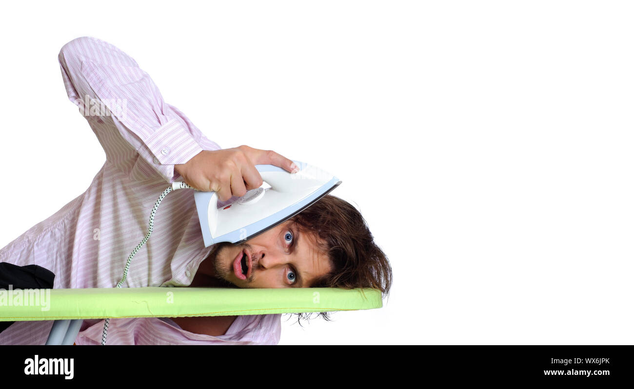 Man decides to take a scolding hot iron to his face Stock Photo - Alamy