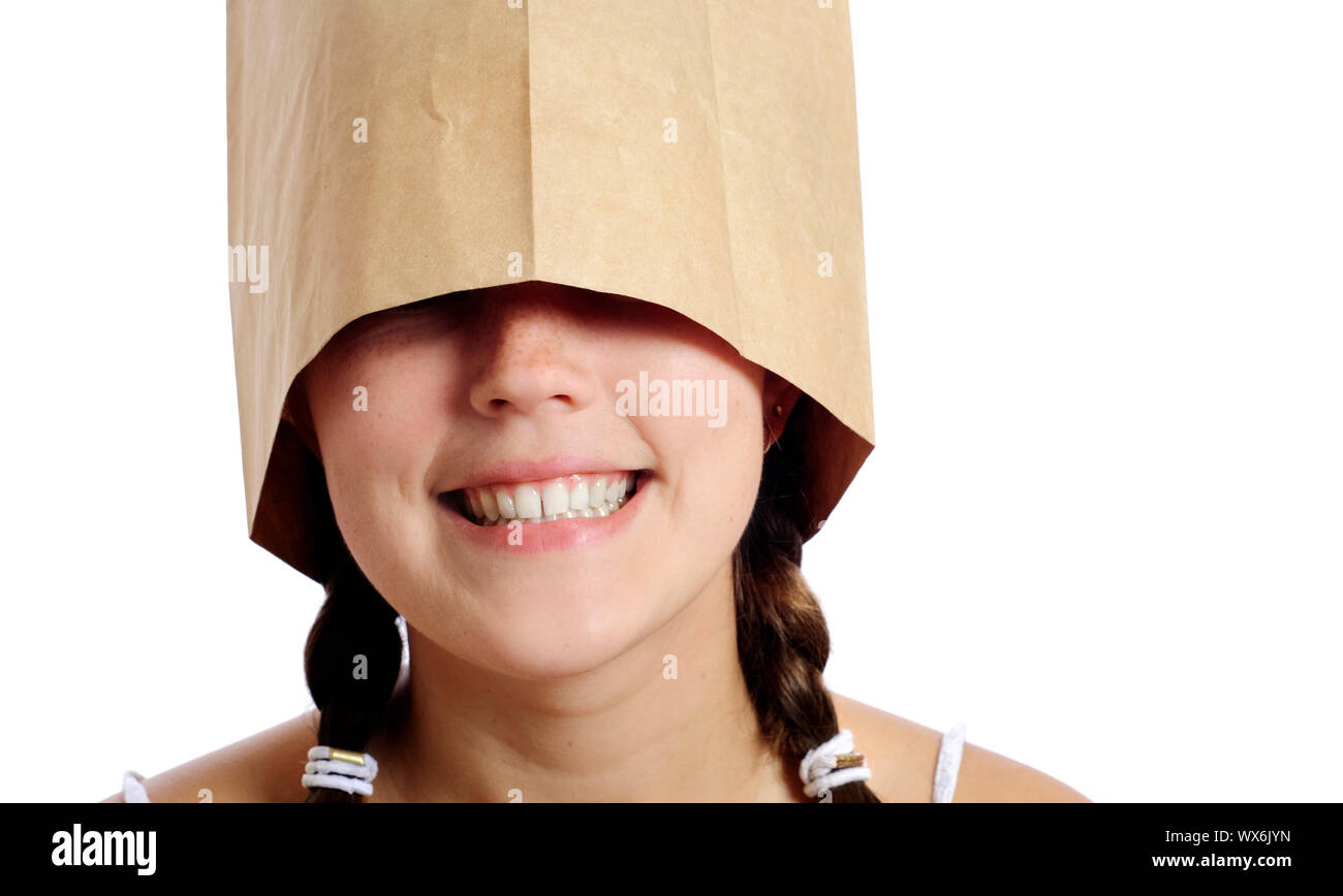 Pretty girl smiles with a paper bag on her head Stock Photo - Alamy
