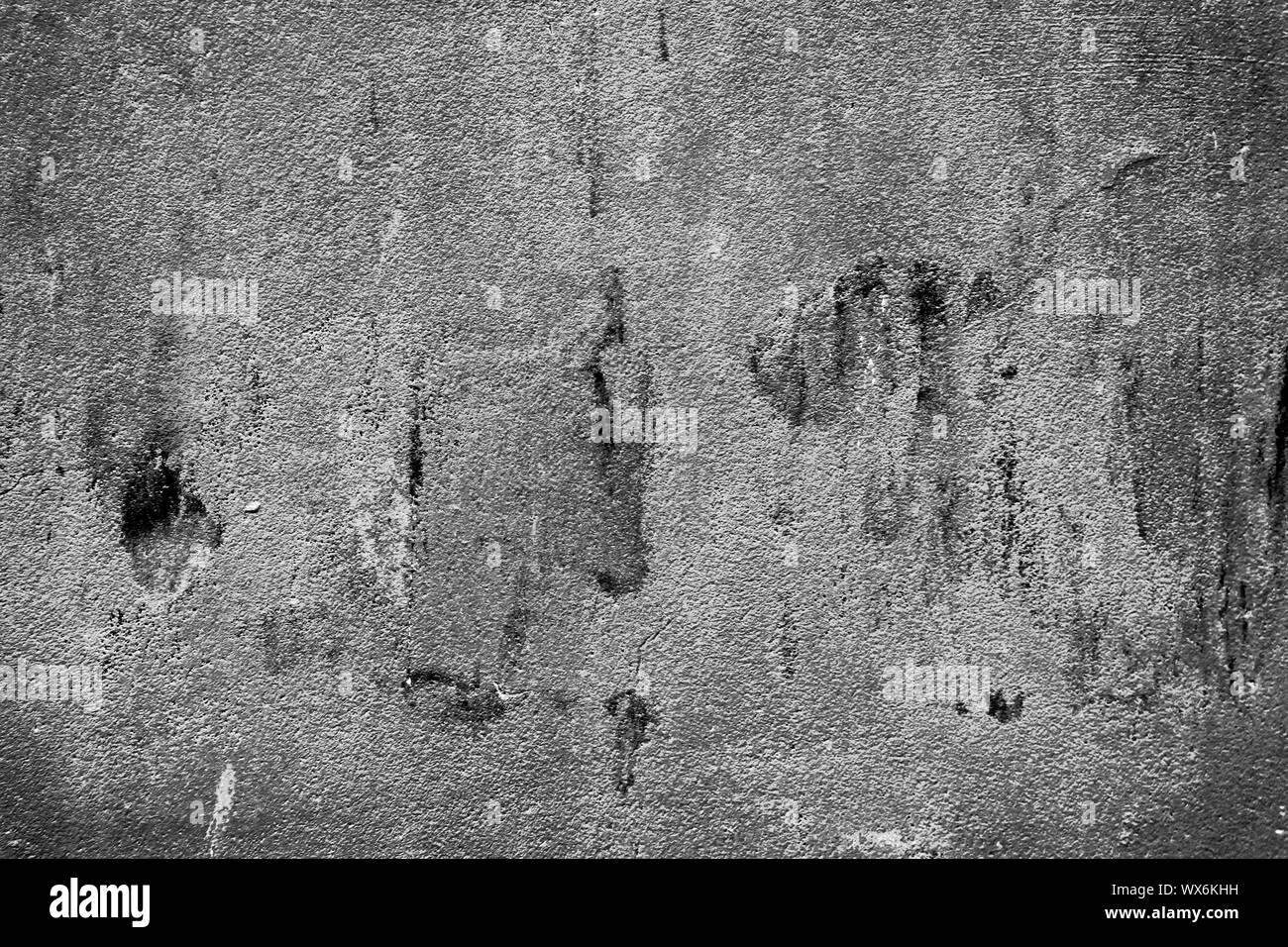 Old concrete wall fragment, painted and peeled stucco texture ...