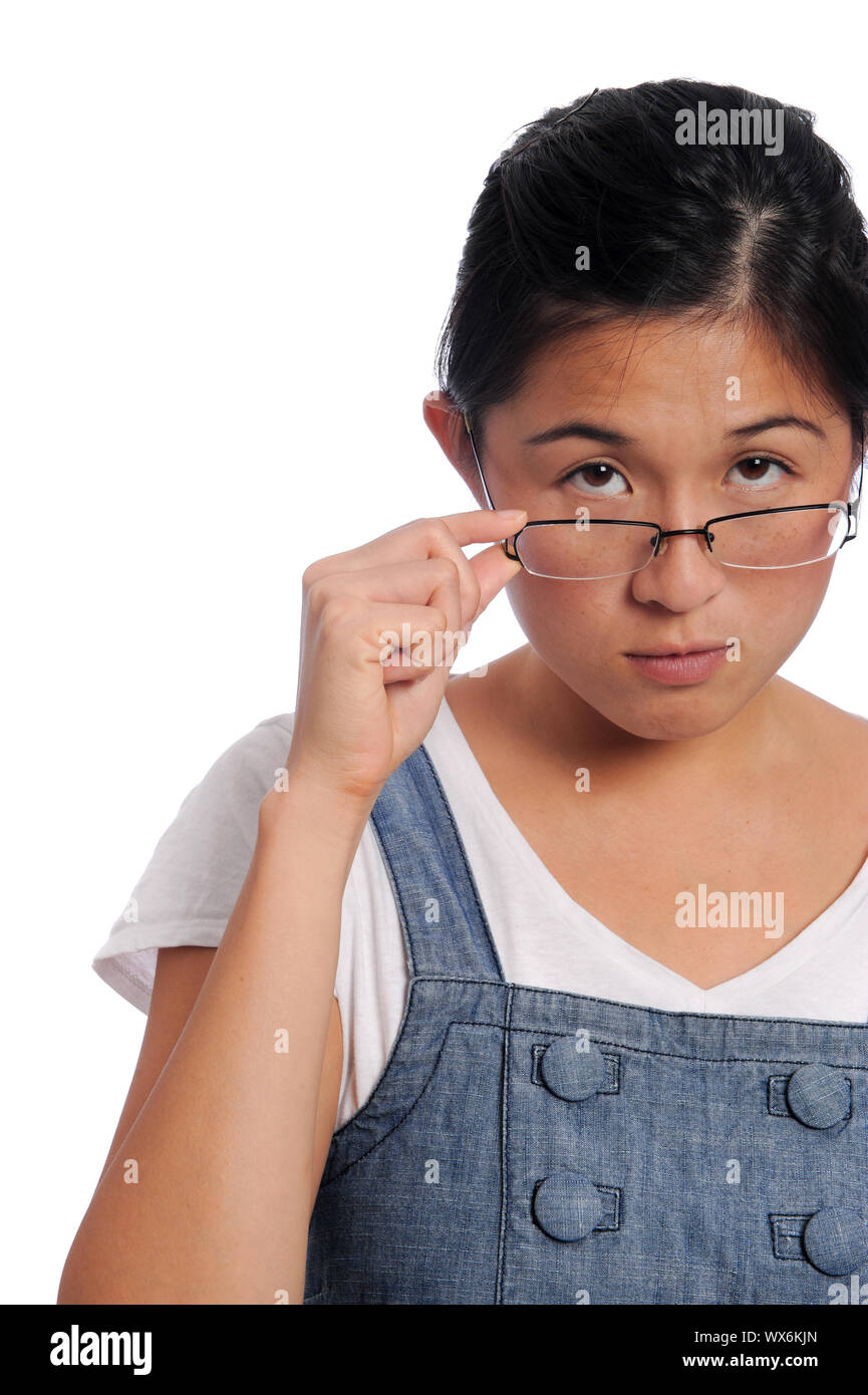 Asian girl looking over her glasses Stock Photo - Alamy