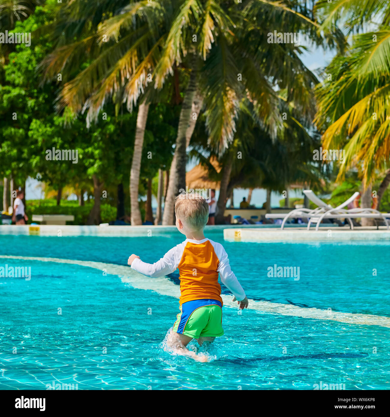 Boy swimming in shallow water hi-res stock photography and images - Alamy