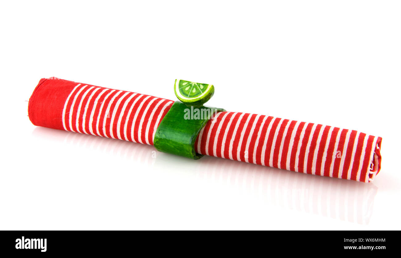 Red and white striped napkin with ring Stock Photo - Alamy