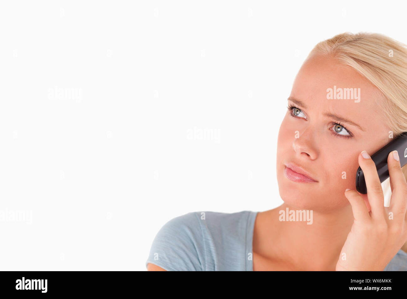 Mature lady on phone unhappy hi-res stock photography and images - Alamy
