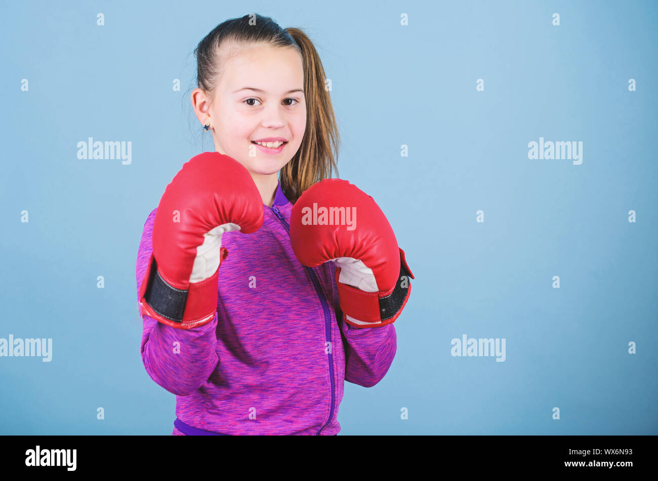 Rise of women boxers. Girl cute boxer on blue background. With great ...