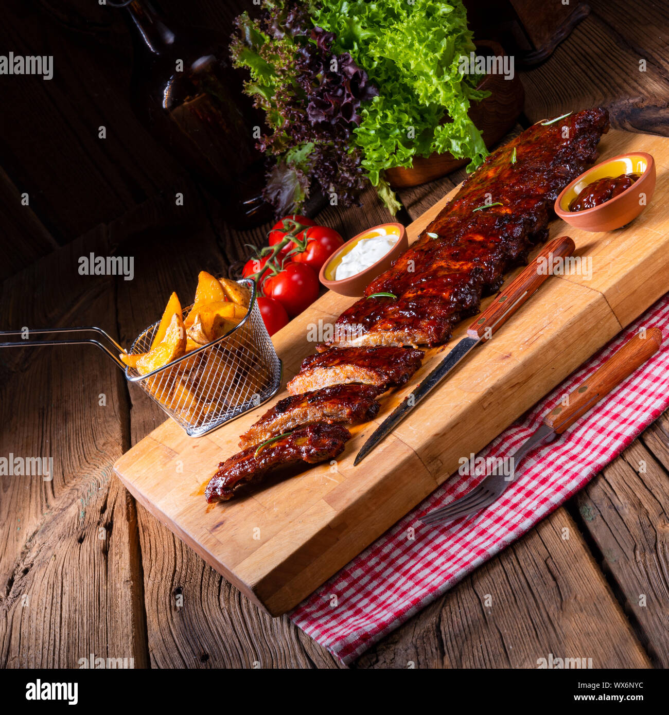 delicious grilled ribs with barbecue barbecue sauce Stock Photo - Alamy