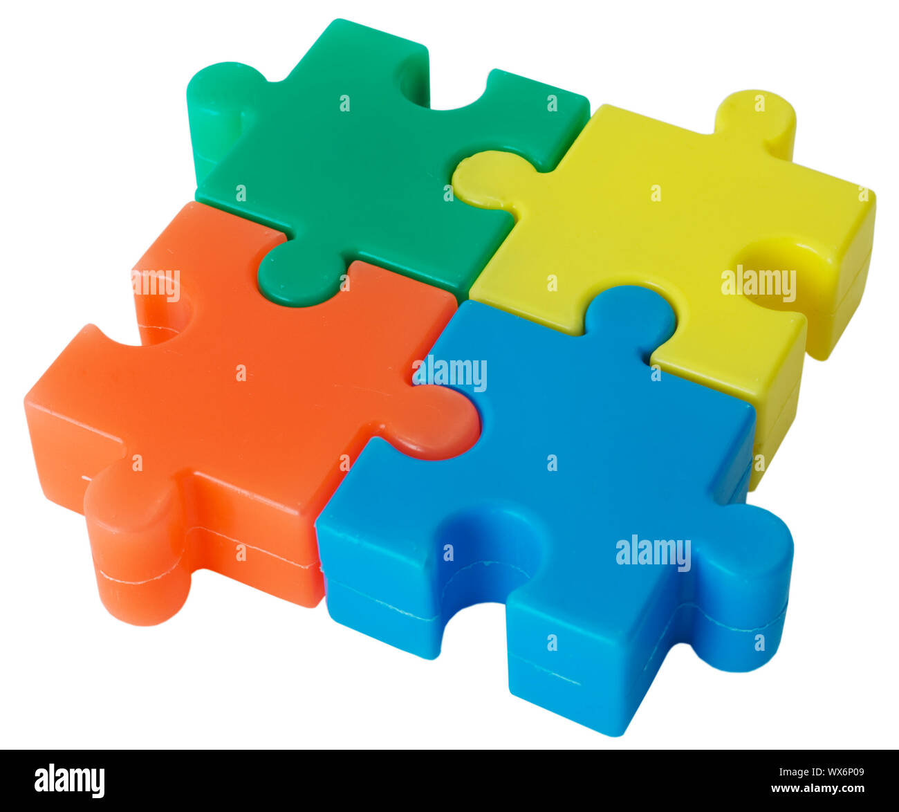 Plastic colored figure from slices puzzle on the white background Stock ...
