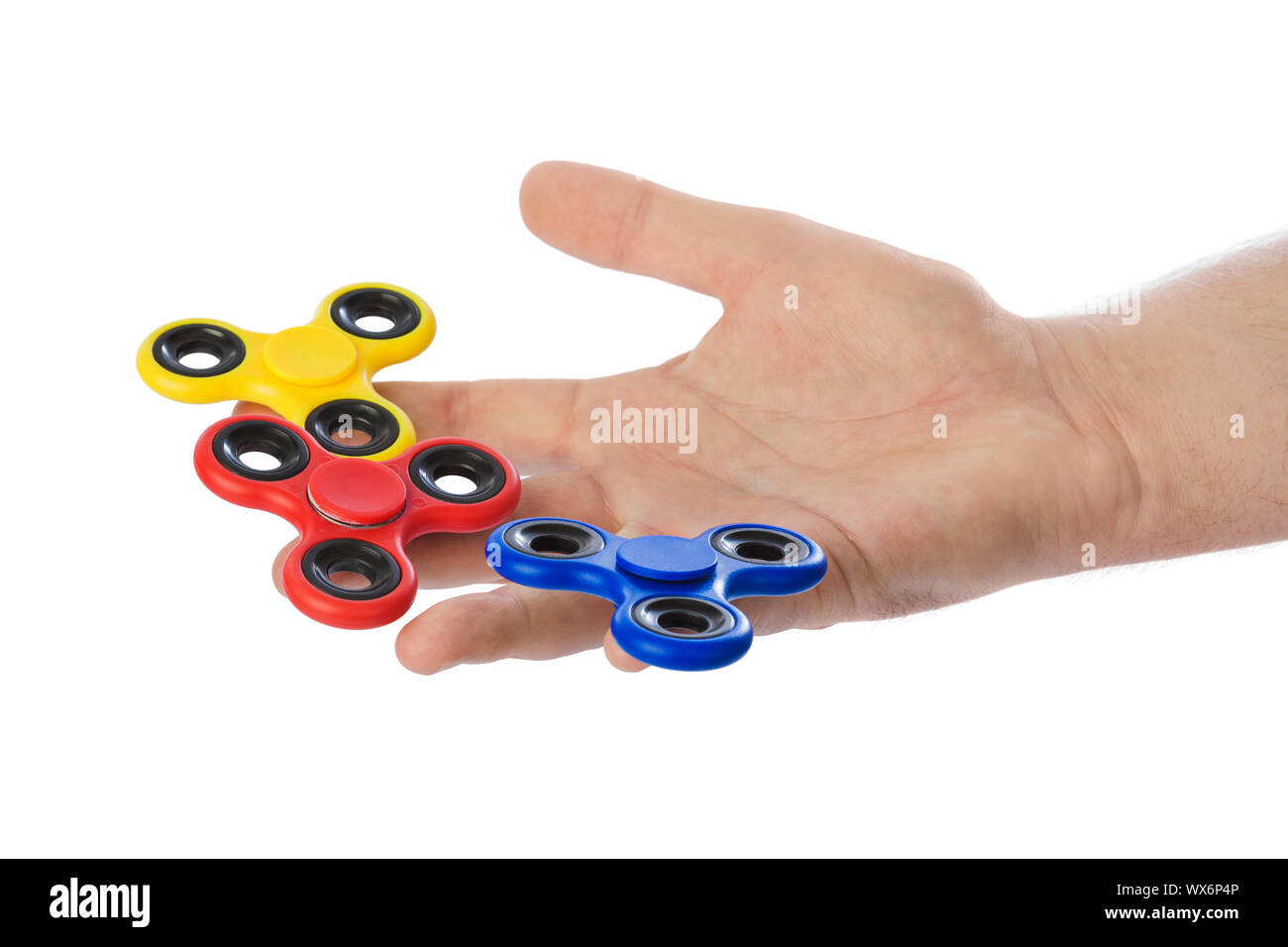 Spinners in hand Stock Photo - Alamy