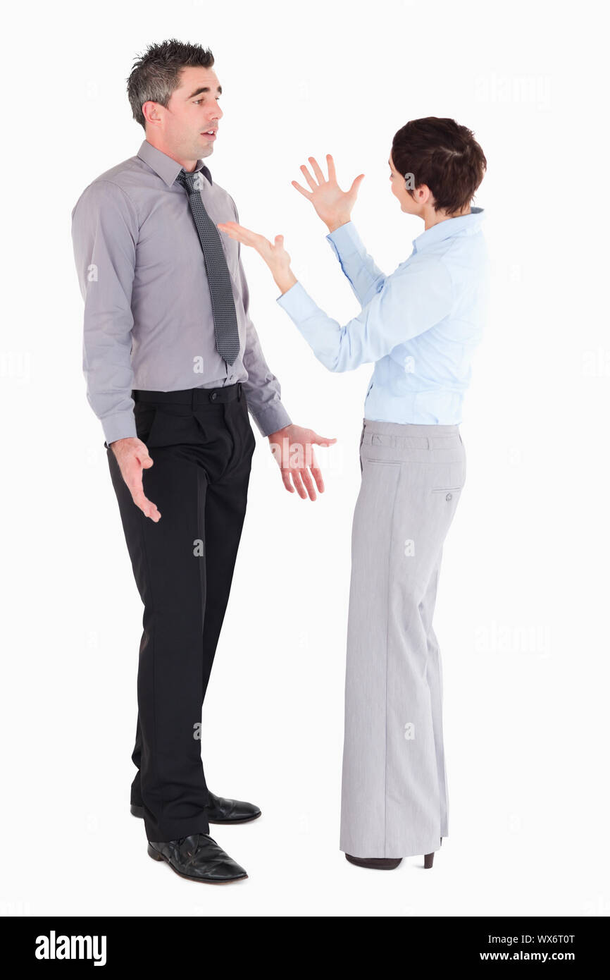 Office workers arguing against a white background Stock Photo - Alamy