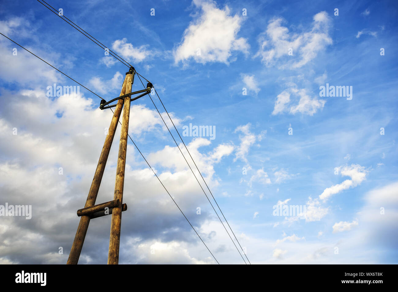 Power Pole and clouds in the sky Stock Photo - Alamy