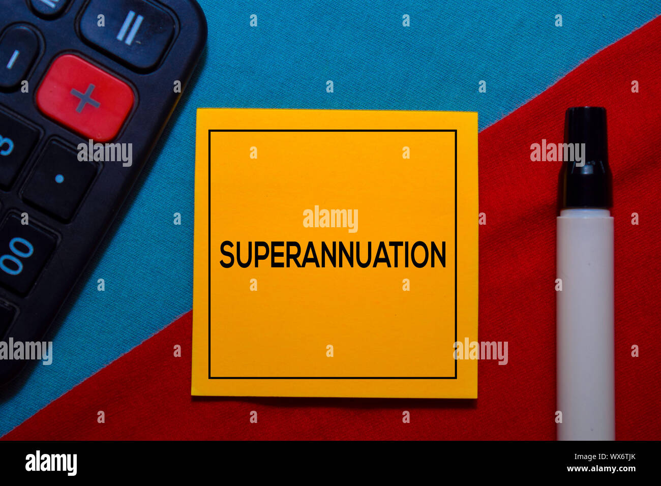 Superannuation on sticky Notes isolated on Office Desk background Stock ...