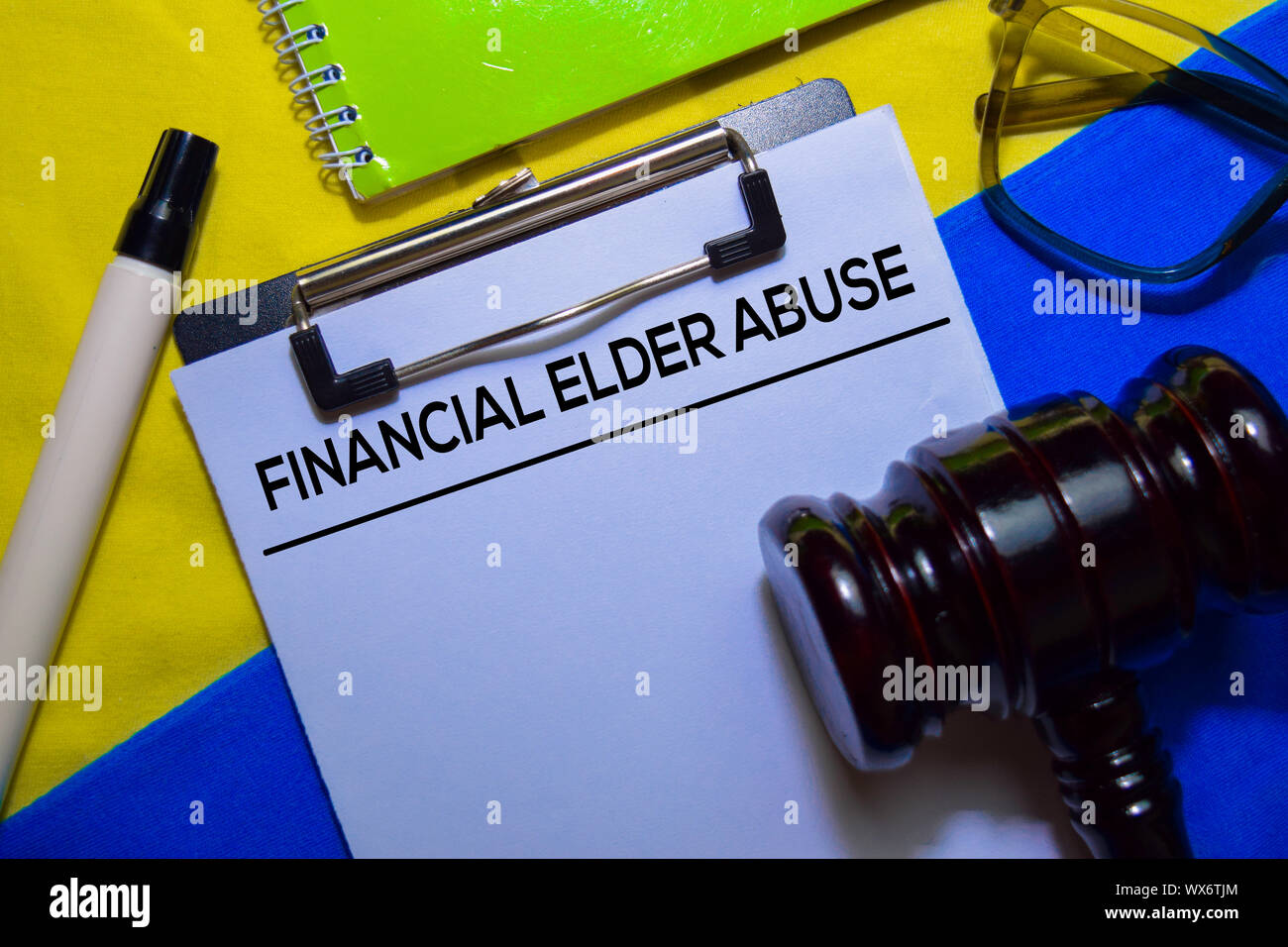 Financial Elder Abuse text on Document form and Gavel isolated on ...