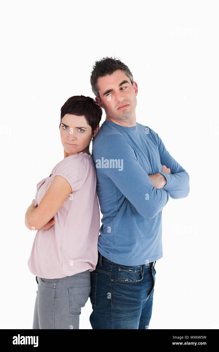 Couple angry at each other standing back to back Stock Photo - Alamy