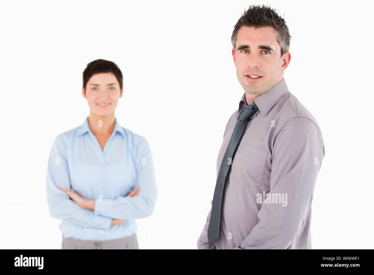 Isolated managers posing against a white background Stock Photo - Alamy