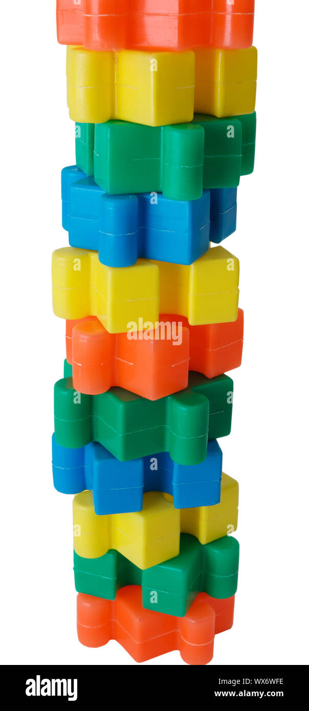 Pyramid built from colored slice puzzle on the white background Stock ...