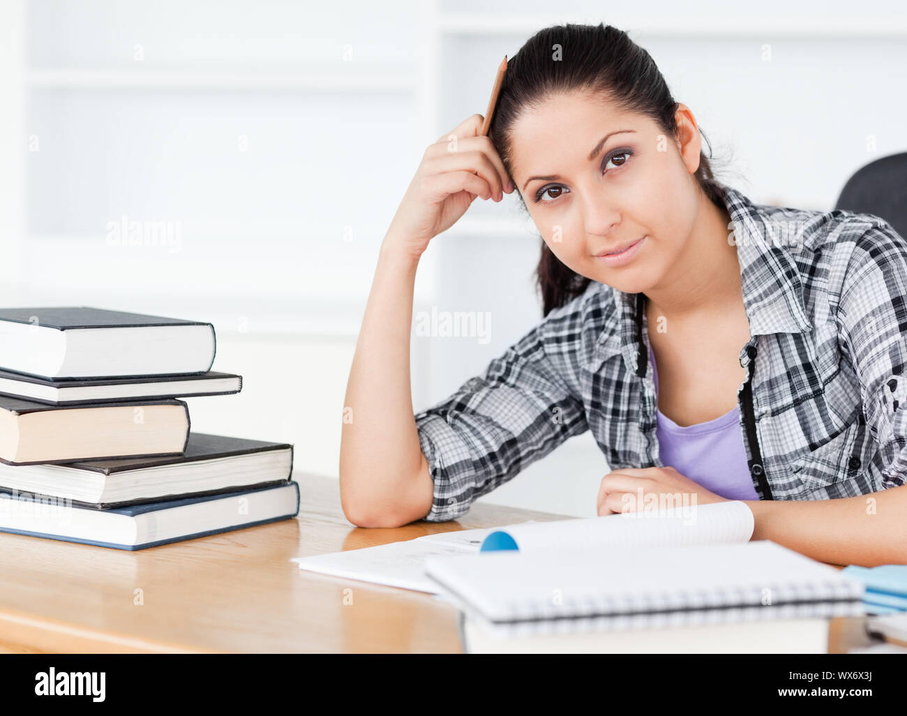A young student is looking into the camera Stock Photo - Alamy