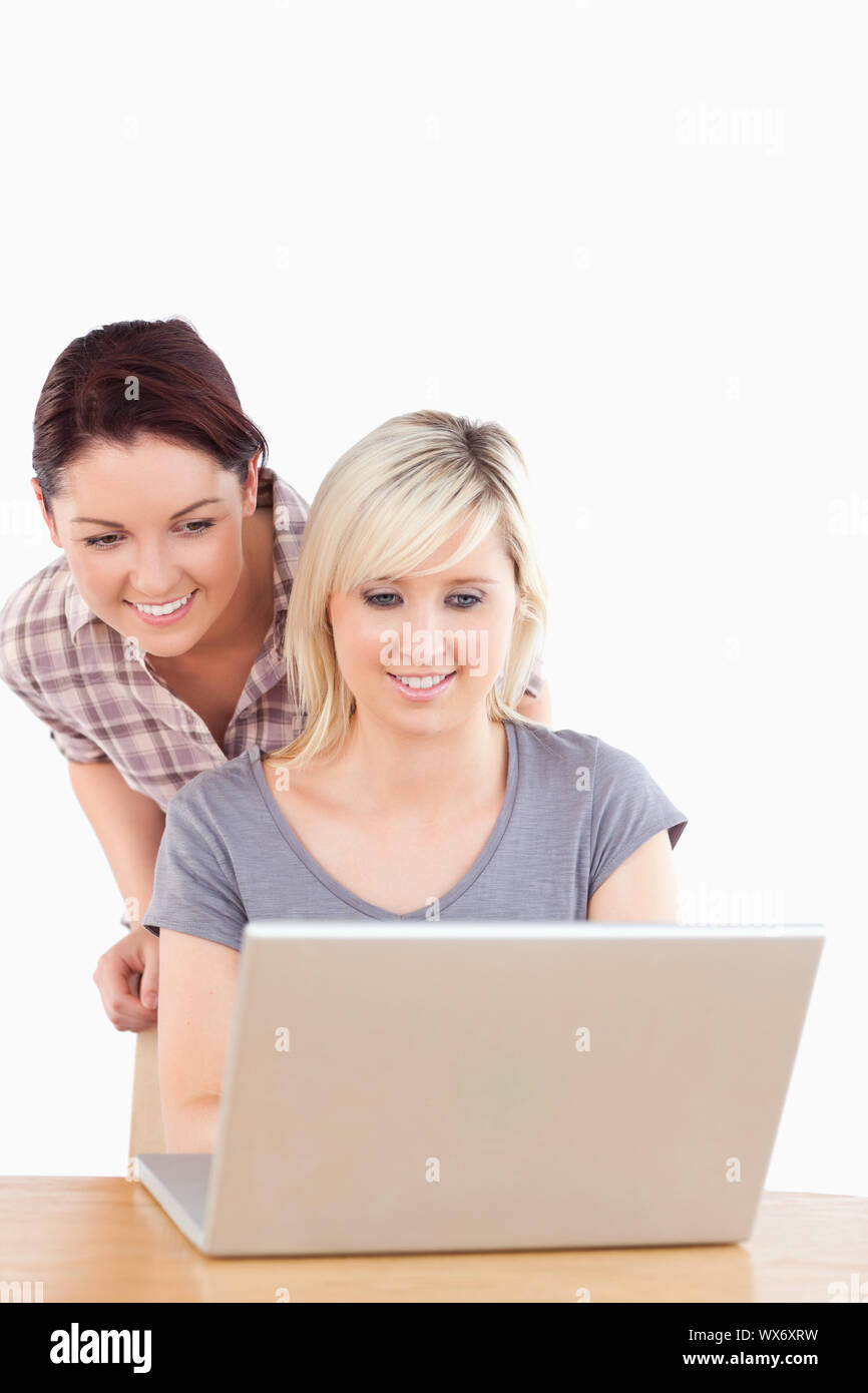 Beautiful women with a laptop in a studio Stock Photo - Alamy