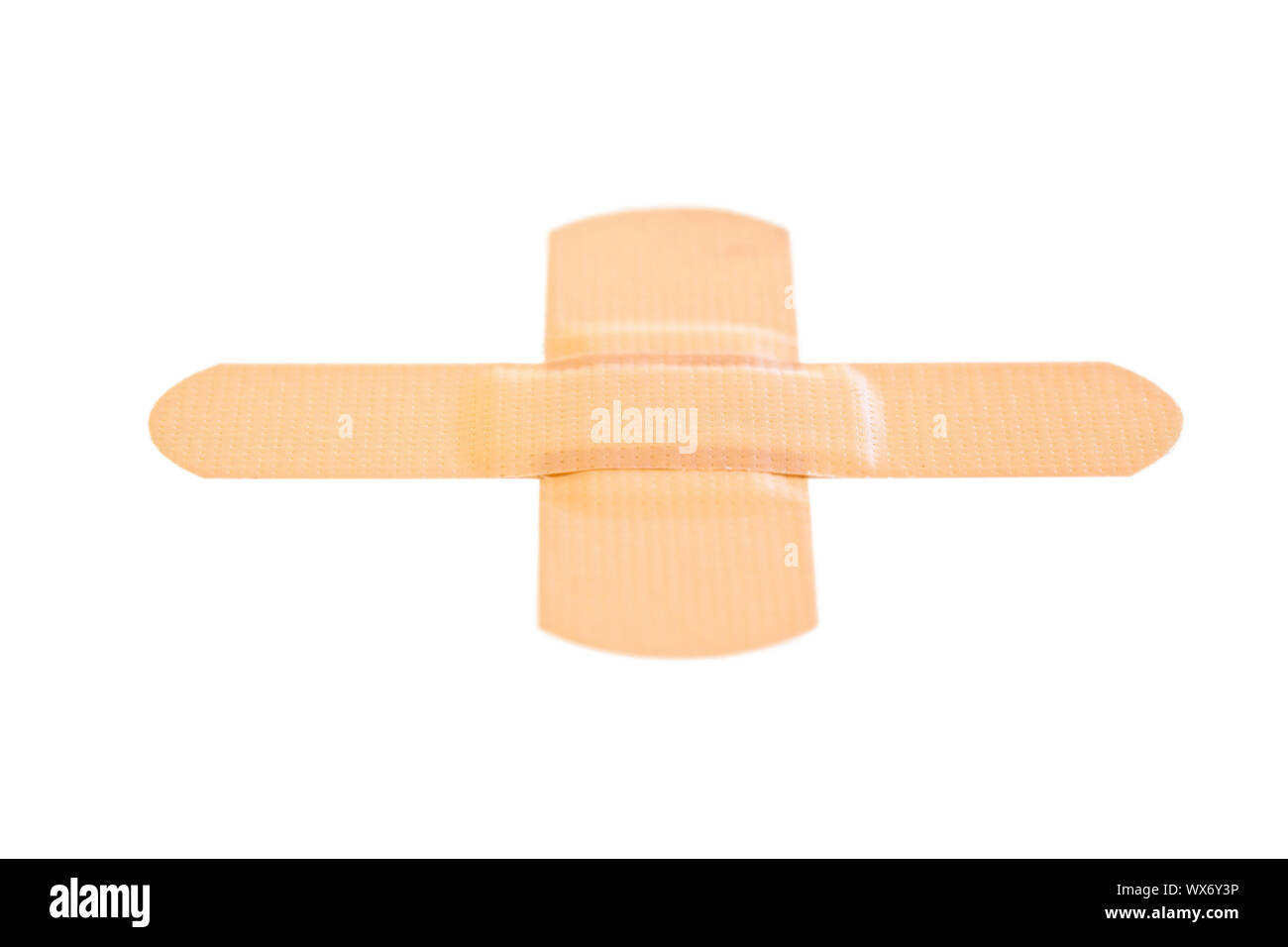 Stuck band-aid on a white background Stock Photo - Alamy
