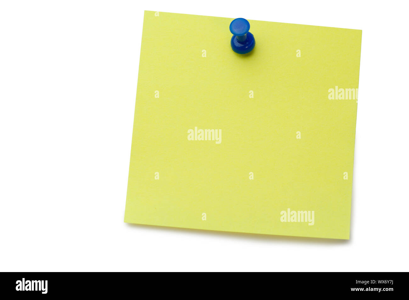 Yellow post-it with drawing pin on a white background Stock Photo - Alamy