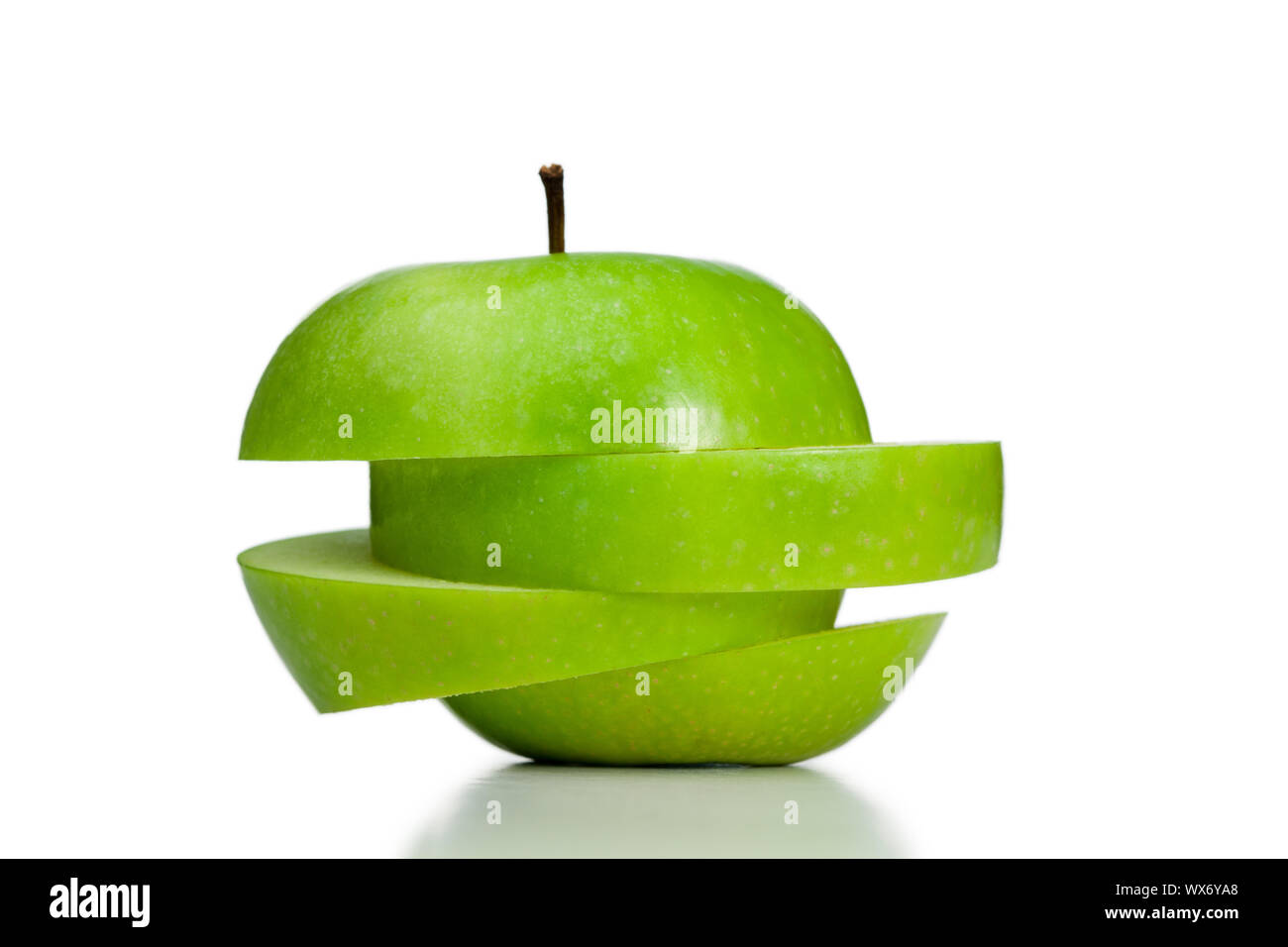 Cut and thrown of center apple on a white background Stock Photo - Alamy