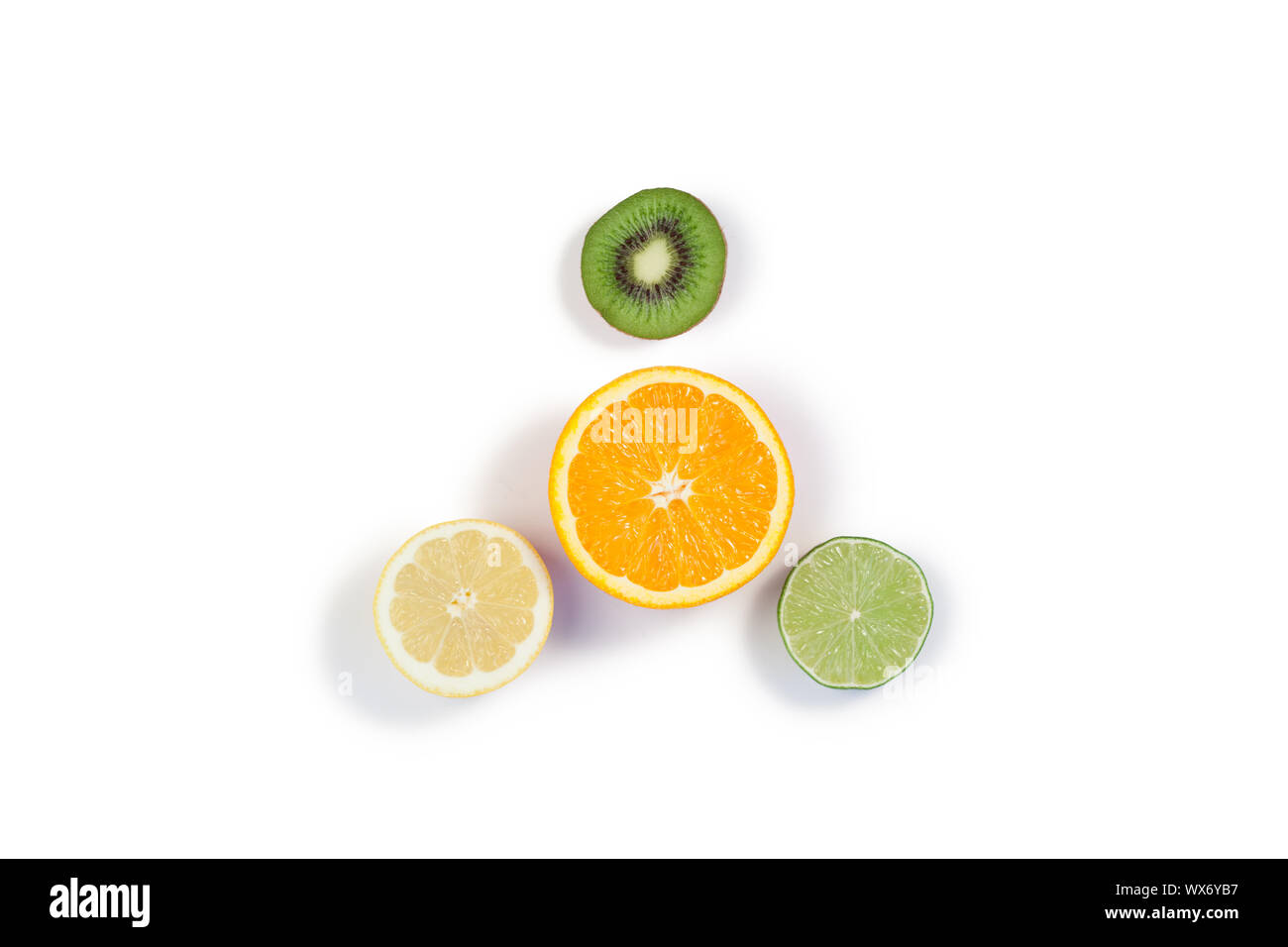 Half fruits on a white background Stock Photo - Alamy