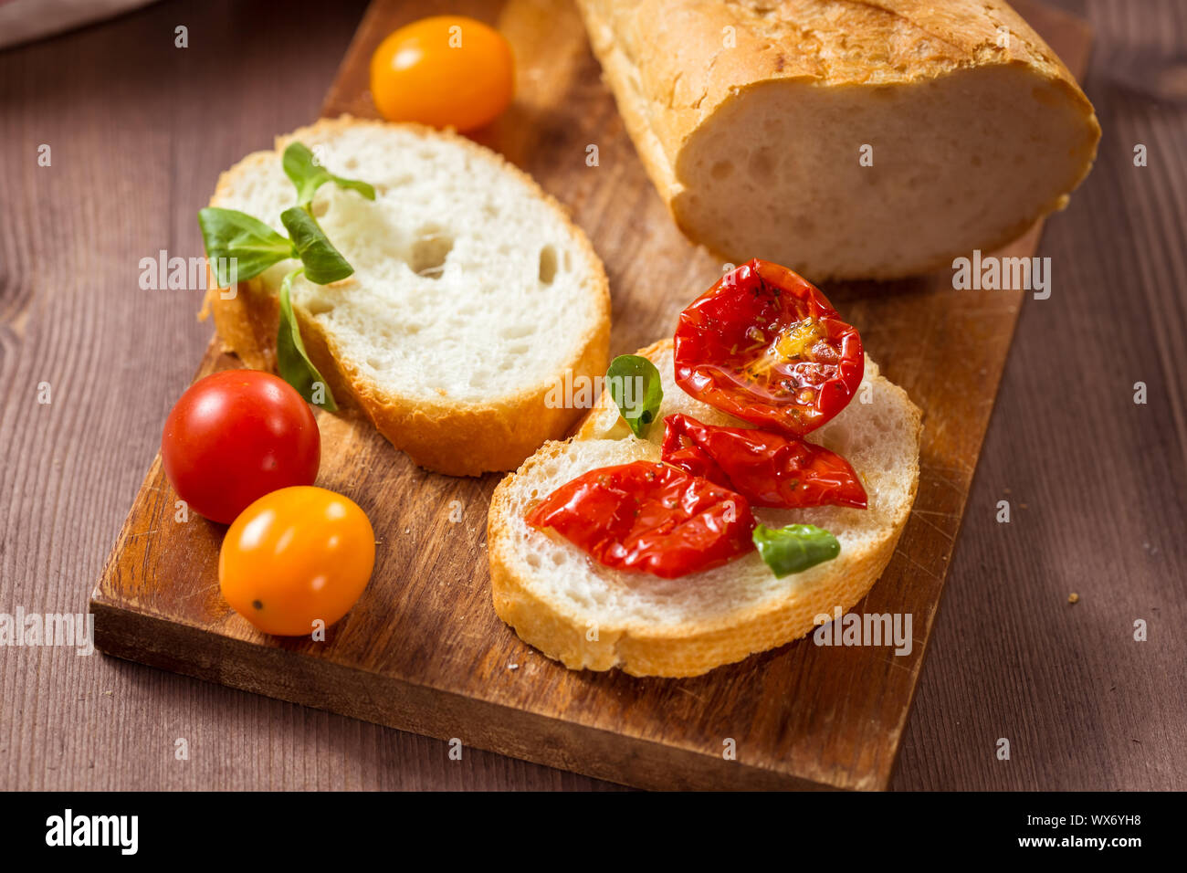 Snack of dried tomatoes Stock Photo - Alamy