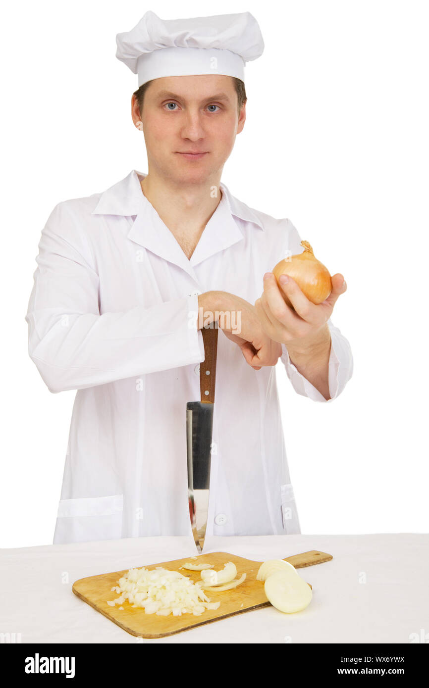 Cook in white overall with knife and preparation board on a white ...