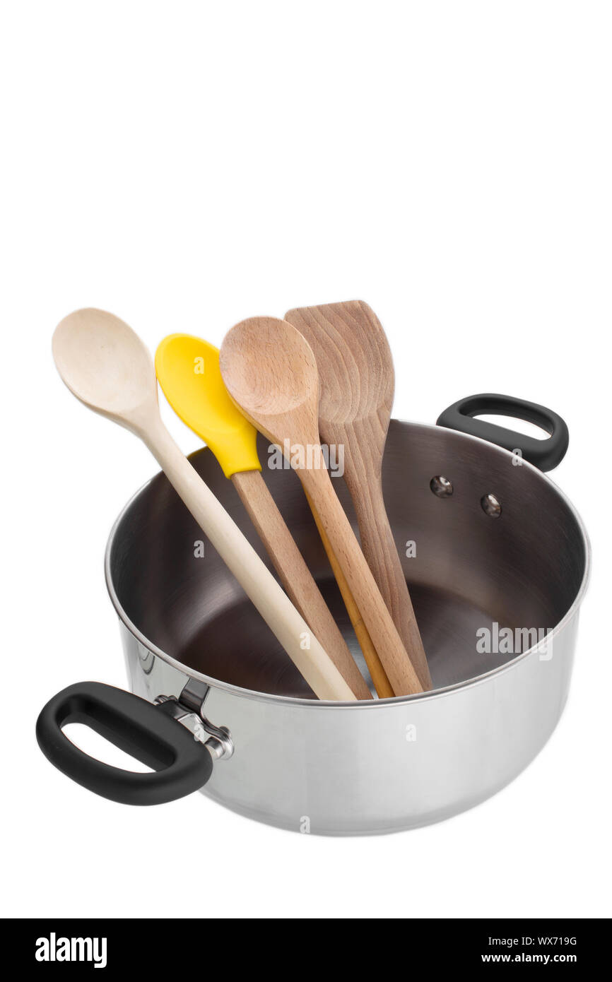 Sauce pan with cooking utensils on a white background Stock Photo - Alamy