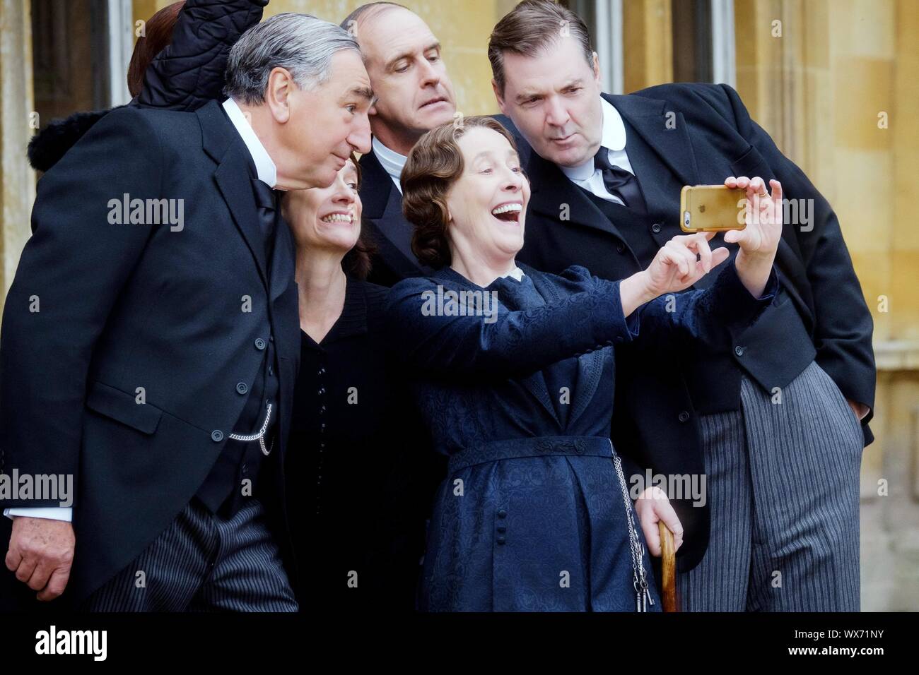 DOWNTON ABBEY, from left: Jim Carter, Raquel Cassidy, Kevin Doyle ...