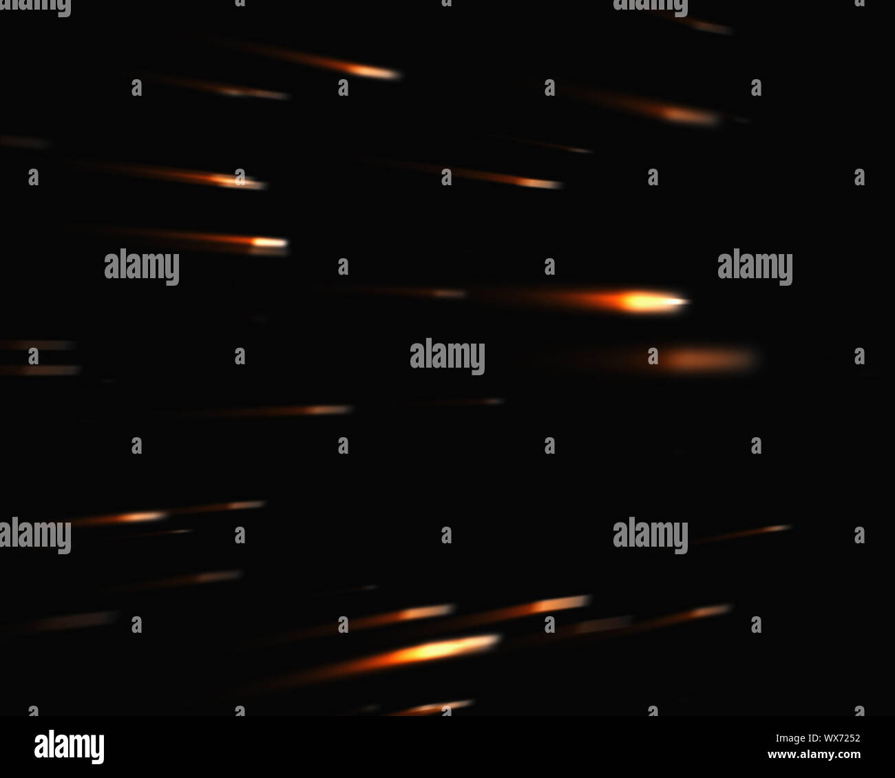 Orange falling stars against black background Stock Photo - Alamy