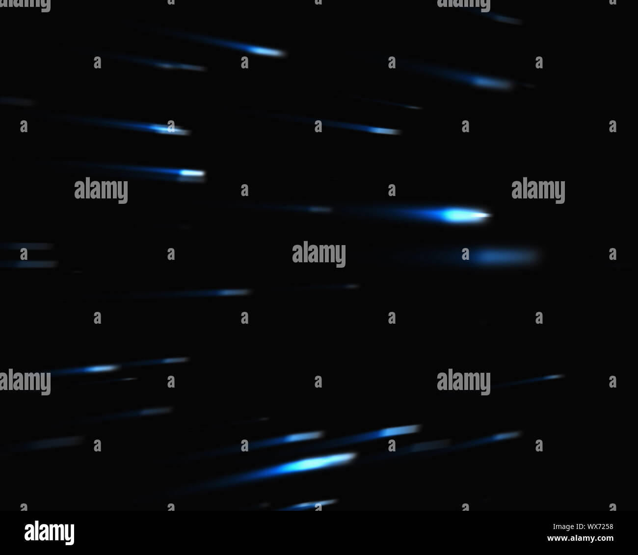 Blue falling stars against black background Stock Photo - Alamy