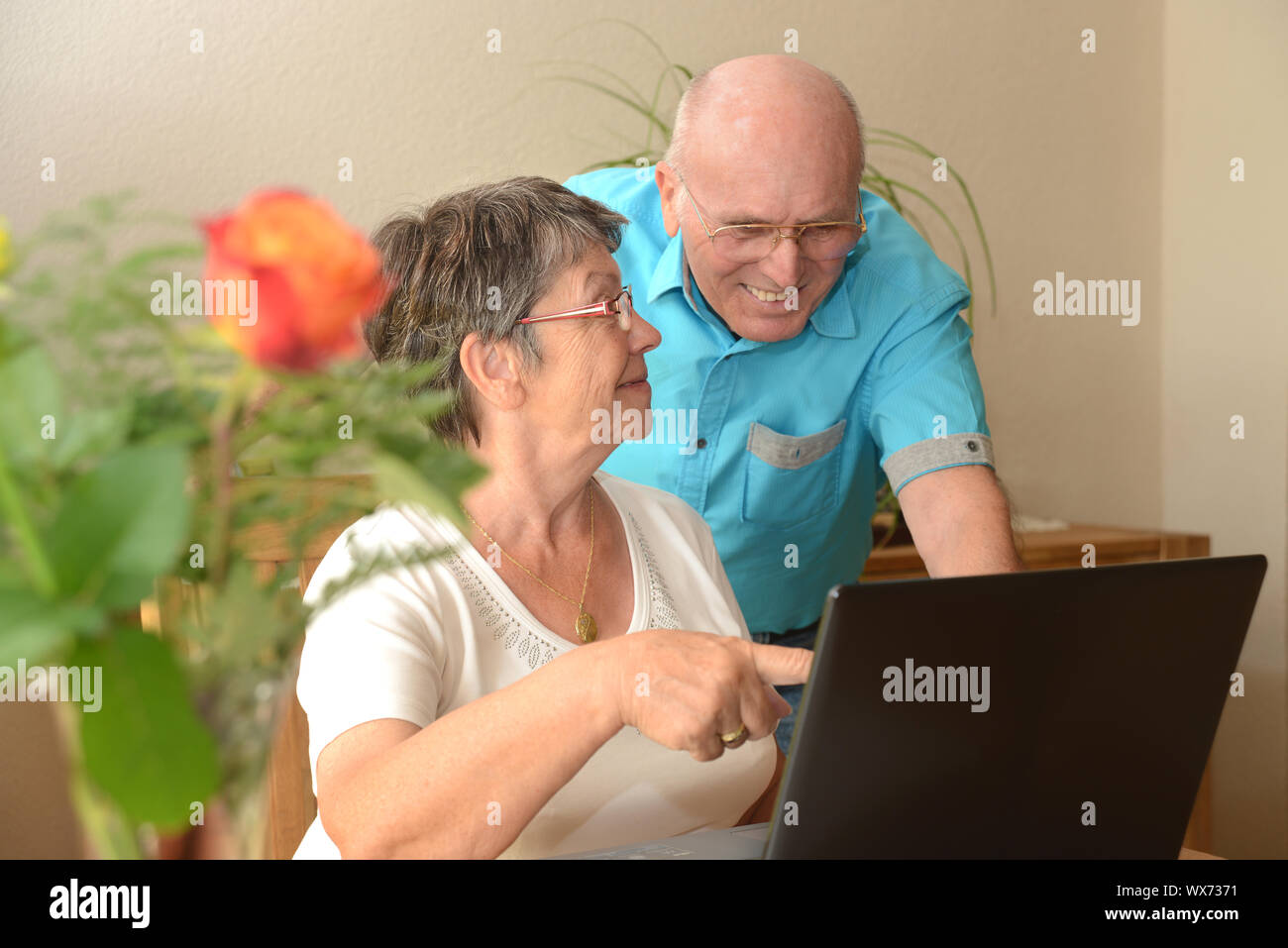 Seniors with a laptop Stock Photo - Alamy