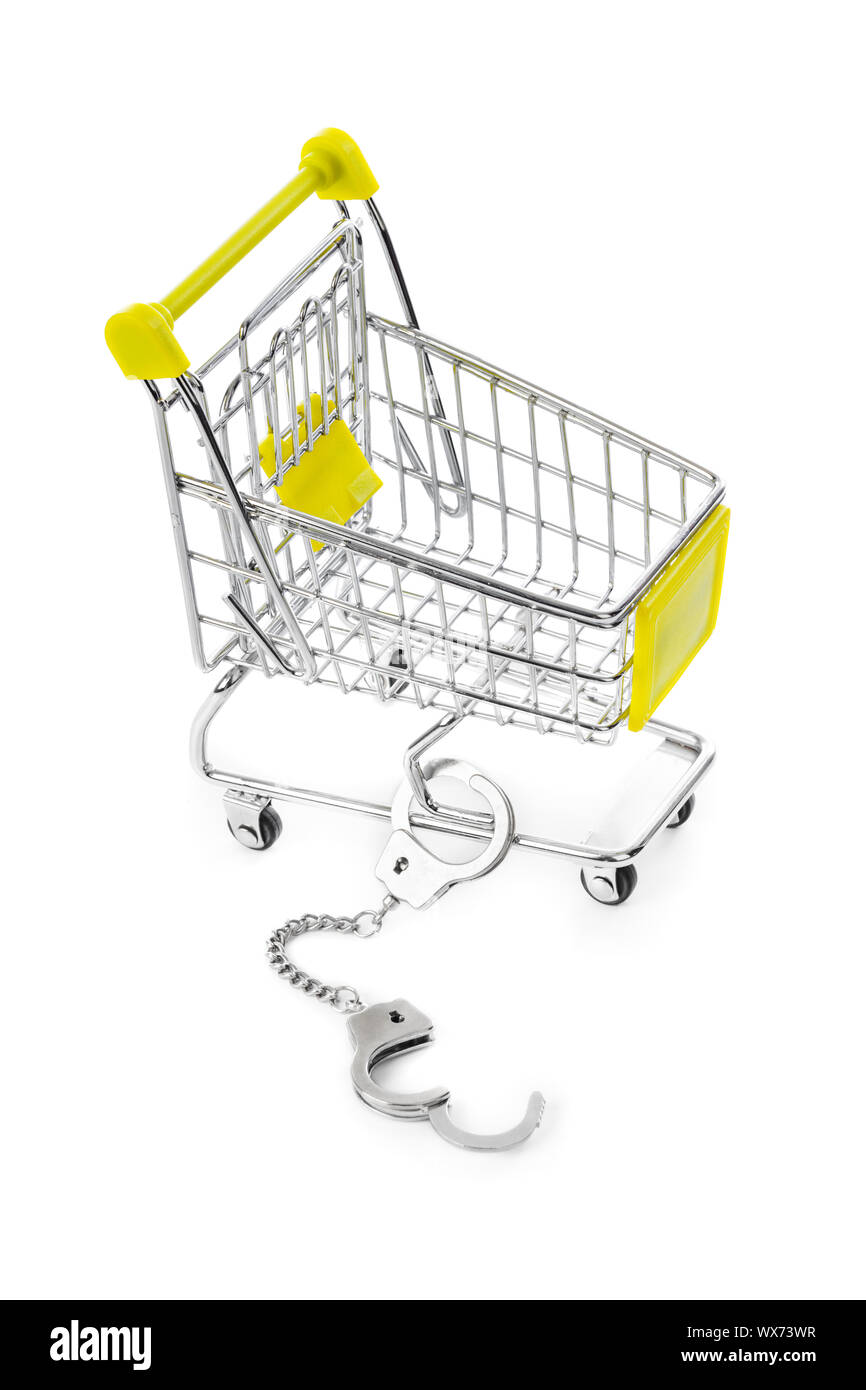 Shopping cart and handcuffs Stock Photo - Alamy