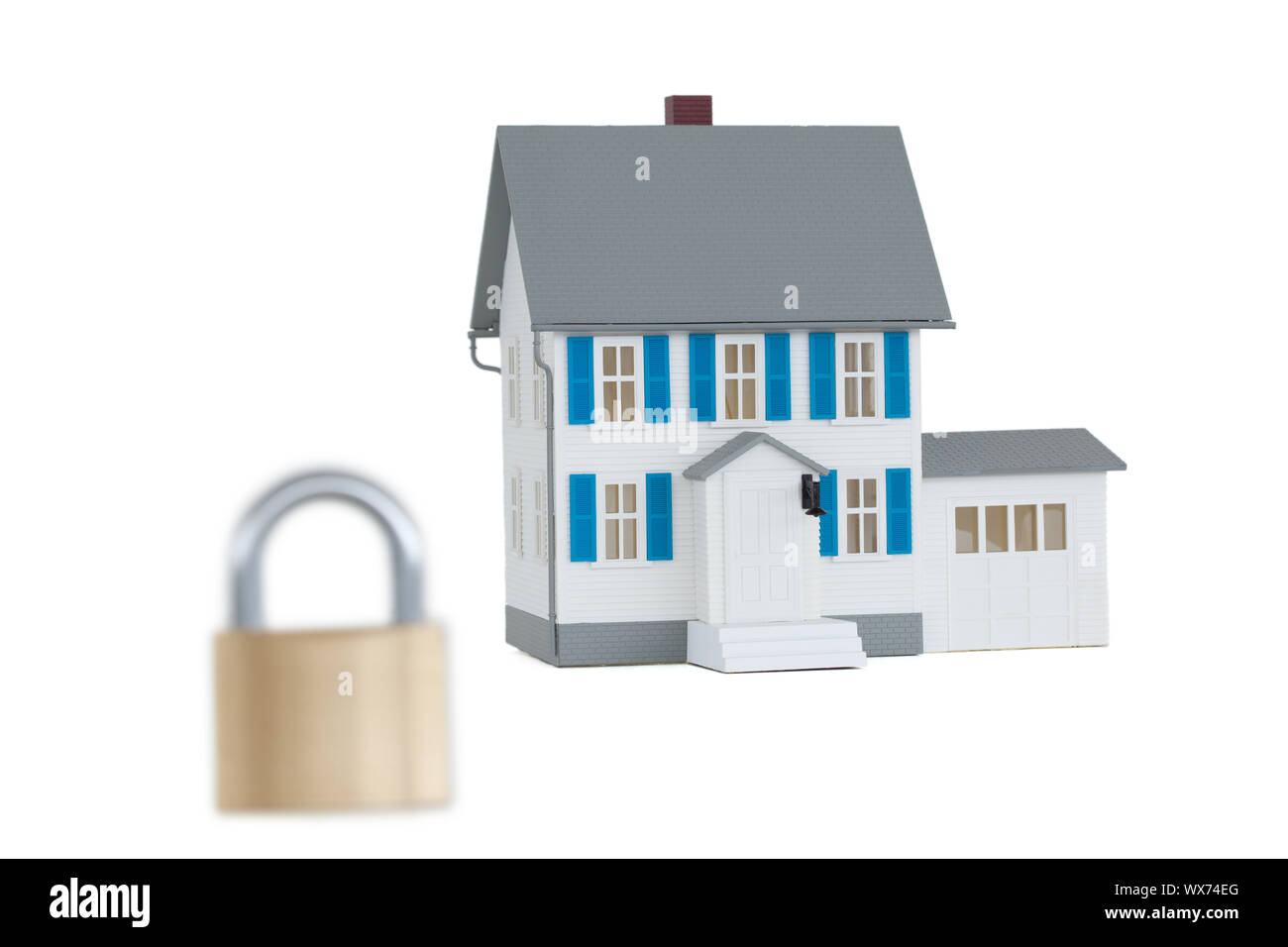 House locked with padlock against a white background Stock Photo - Alamy