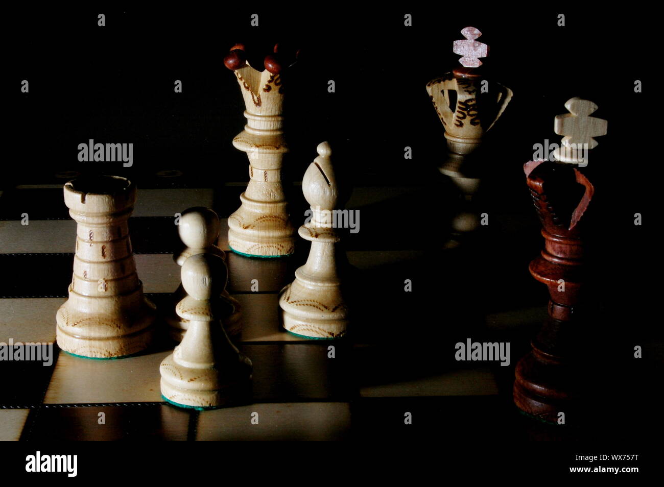 chess pieces on chess board showing power and success Stock Photo - Alamy