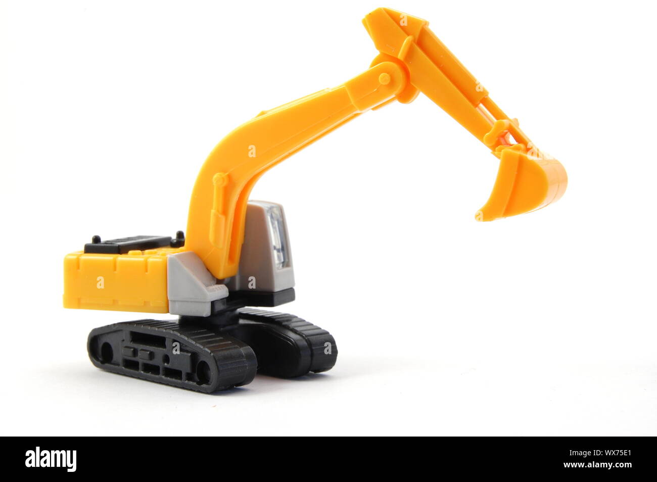 toy digger showing concept for construction company Stock Photo - Alamy