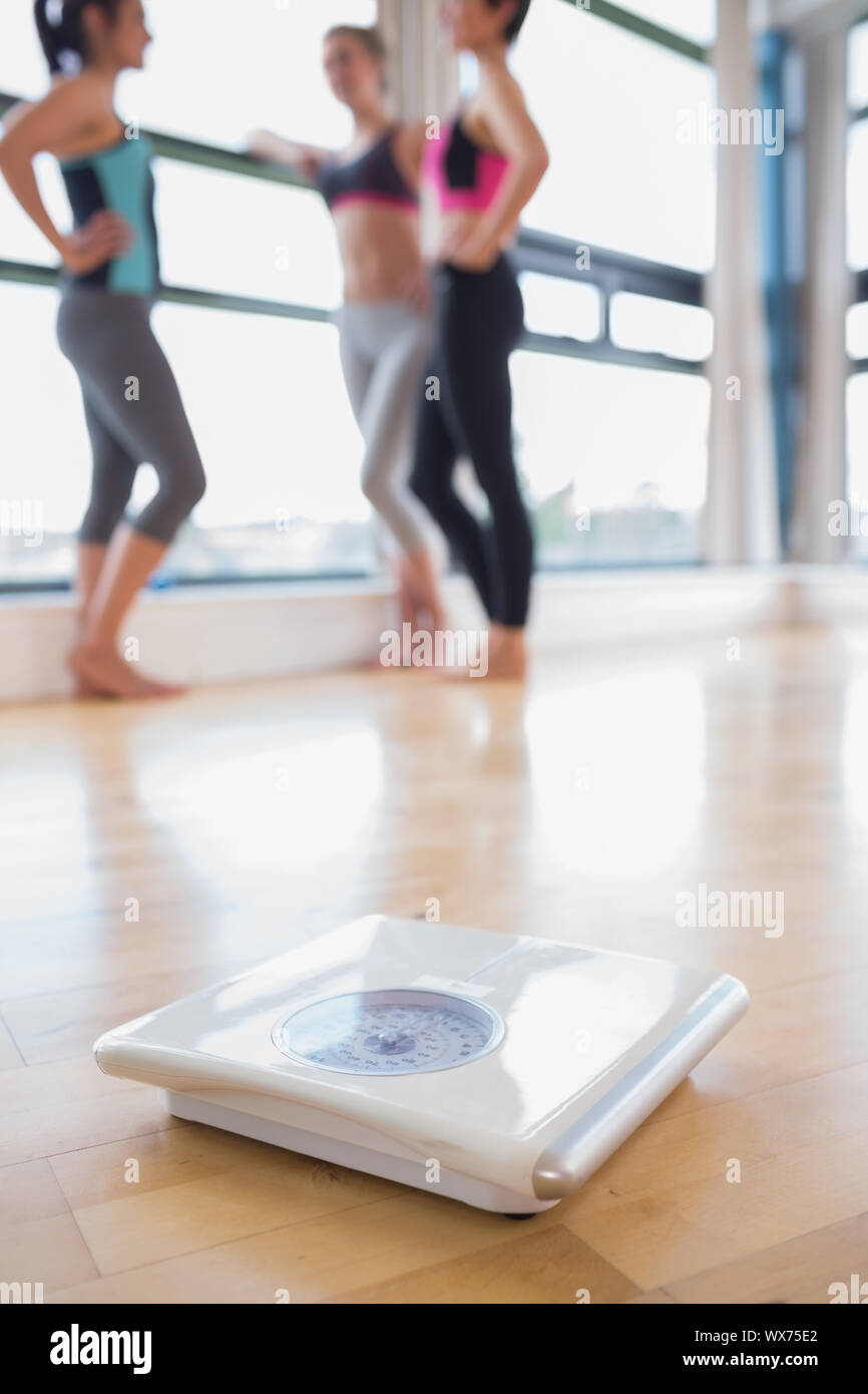 Weighing scales on floor of fitness studio Stock Photo - Alamy
